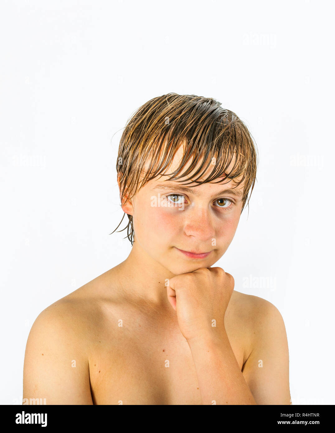 smart handsome boy with wet hair poses in Studio Stock Photo - Alamy