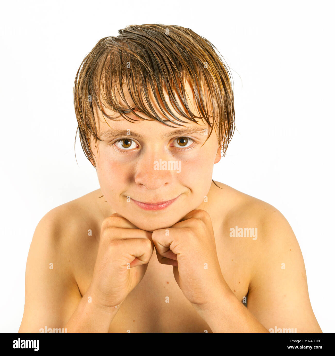 smart handsome boy with wet hair poses in Studio Stock Photo - Alamy