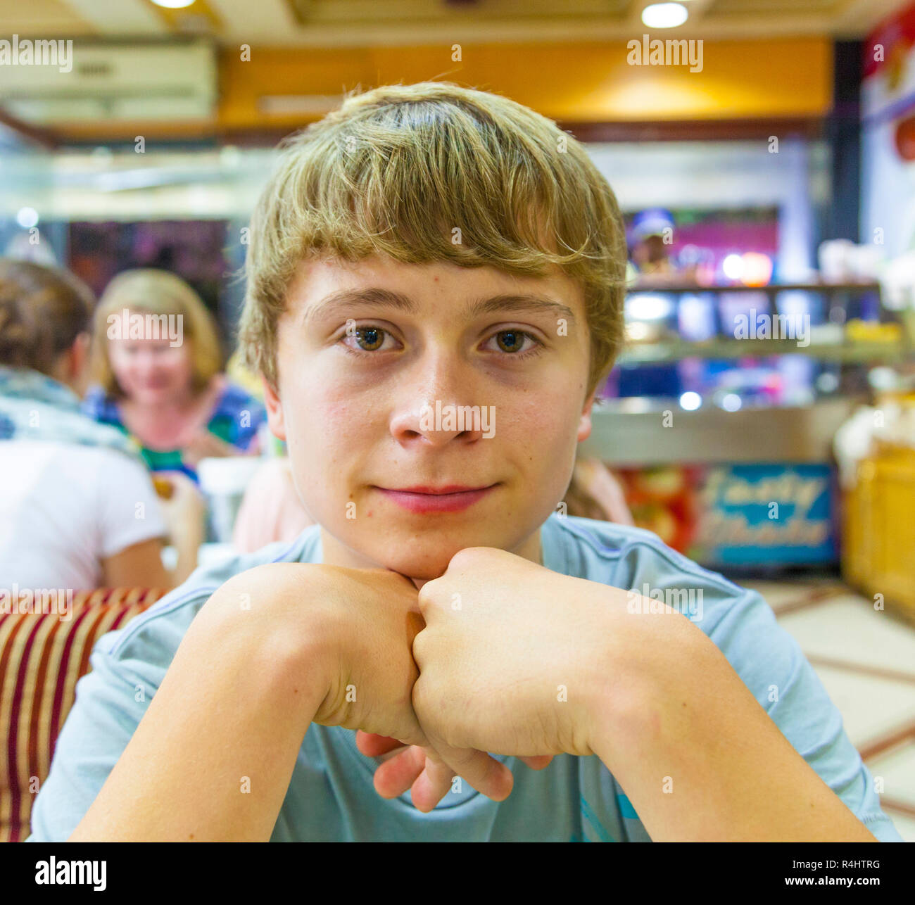 boy in arestauant waits for the food Stock Photo - Alamy