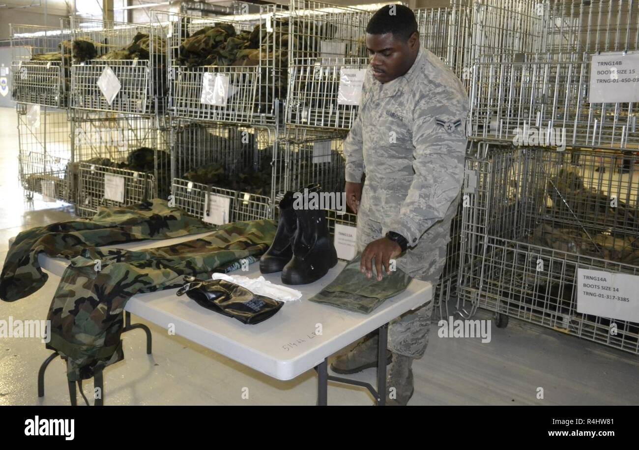 An airman from the 87th Logistics Readiness Squadron displays military ...