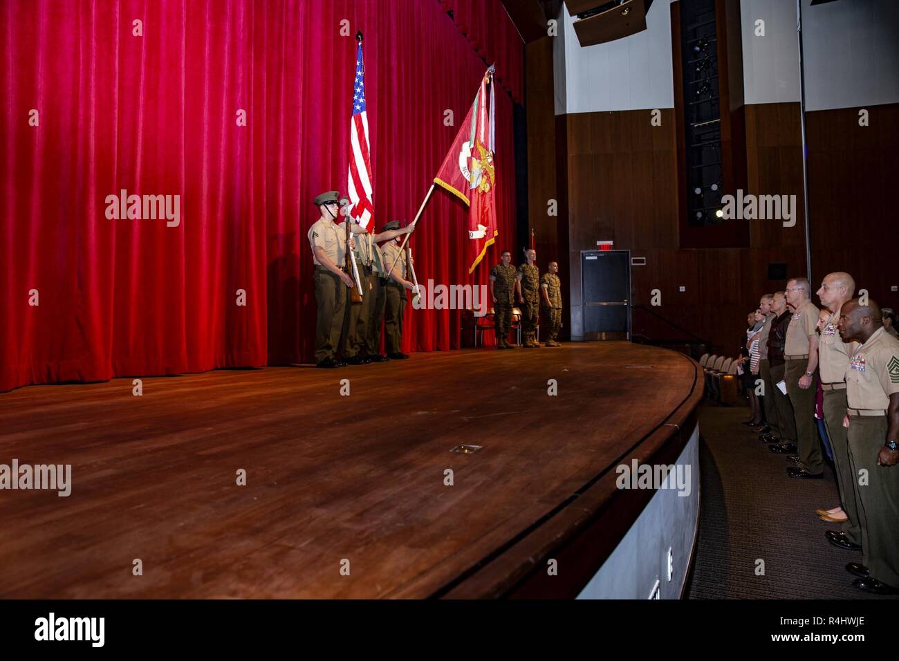 U.S. Marines and guests render honors during a Headquarters and Service ...