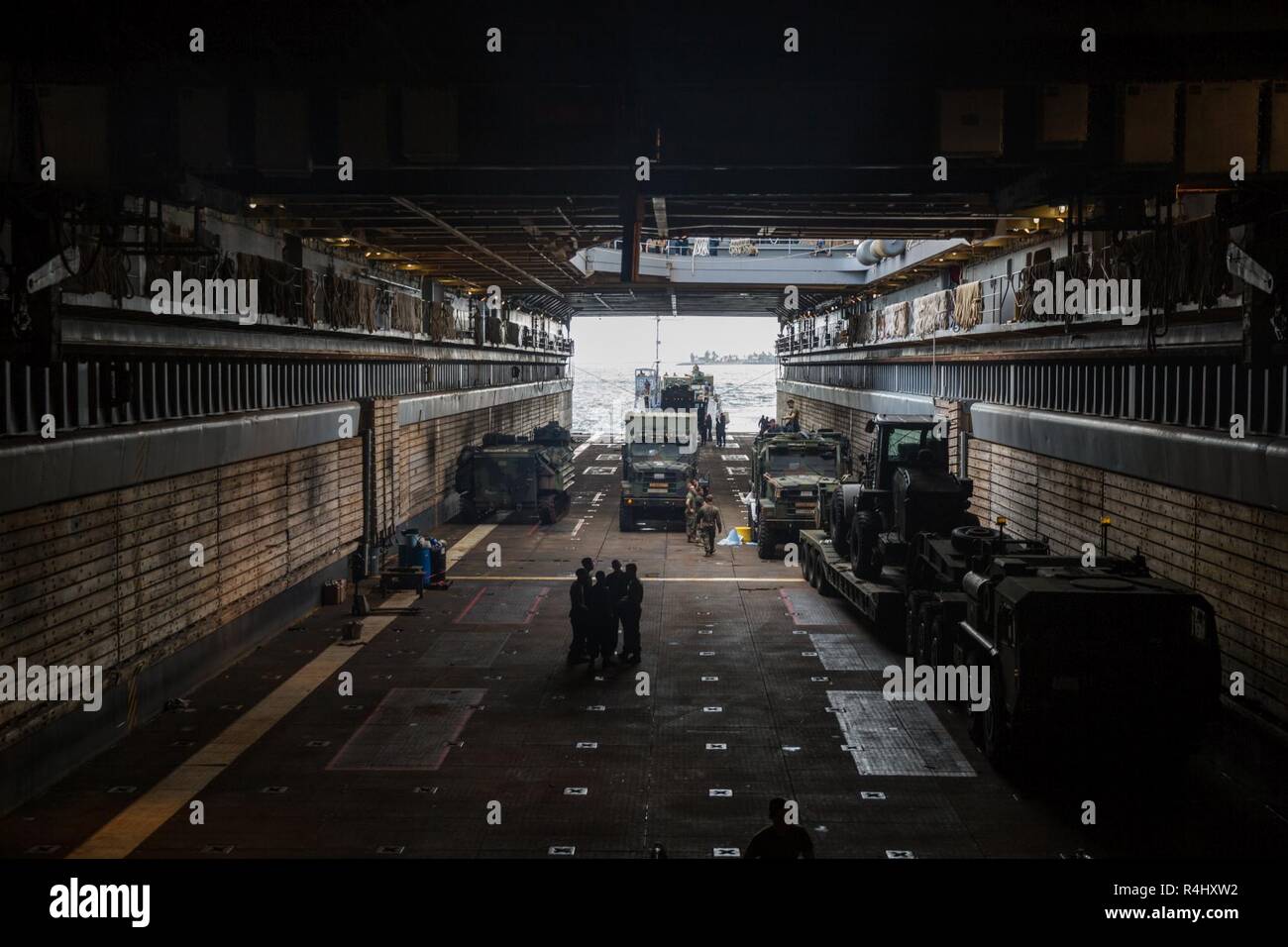 Marines with Combat Logistics Battalion 31 prepare to move a low bed ...
