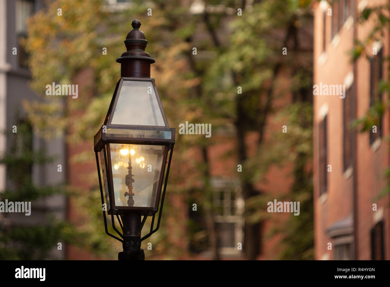Old style street lamp in front of brownstones on Beacon Street, Back ...