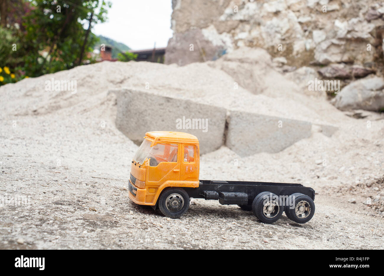 Yellow toy trucks hi-res stock photography and images - Alamy