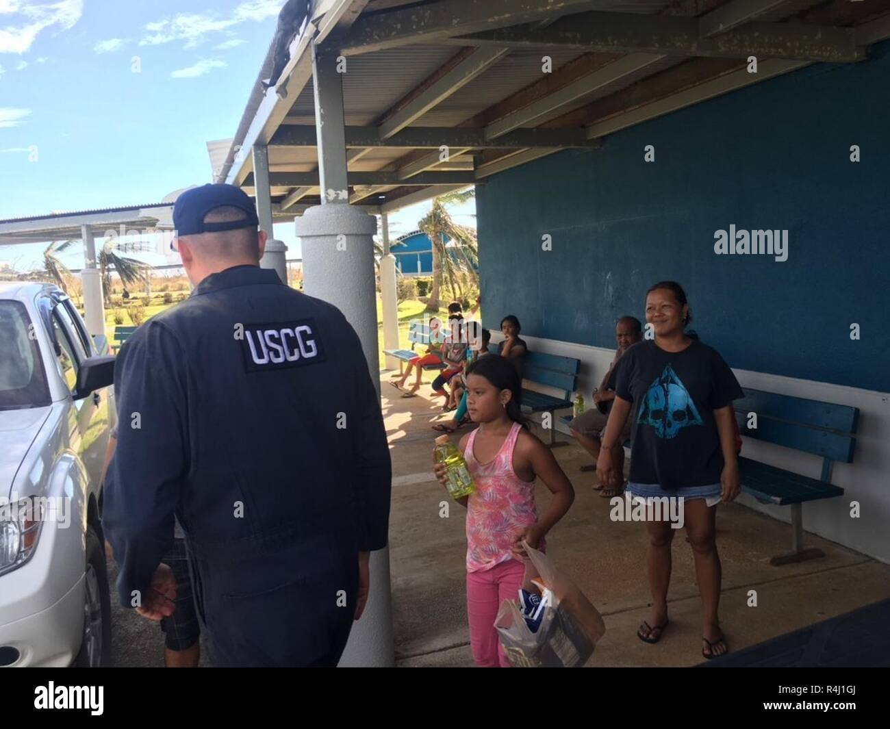 Crewmembers from throughout the Coast Guard Sector Guam deliver donated ...