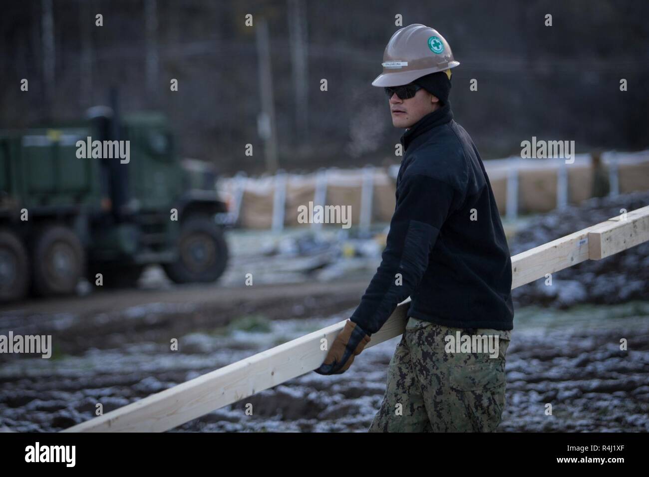 U.S. Navy Equipment Operator Gerardo Peralesmedina with 22nd Naval ...