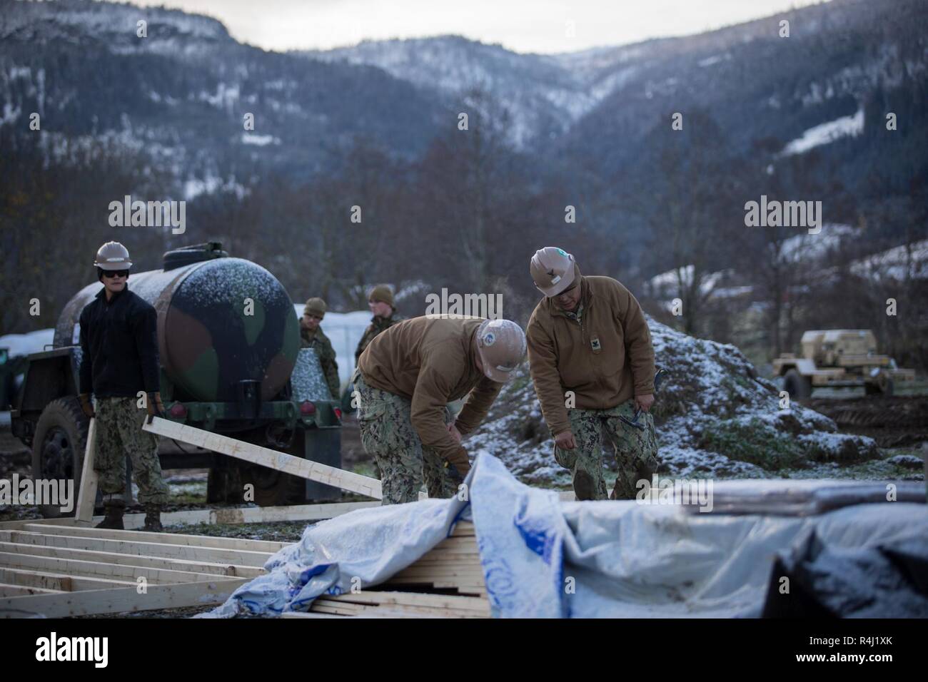 U.S. Navy Seabees with 22nd Naval Construction Regiment build ...