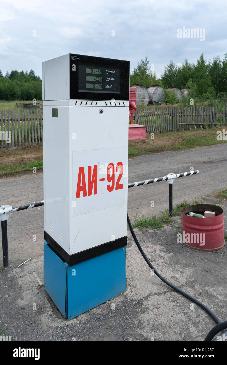 View of white old Soviet fuel dispenser with electronic counter ...