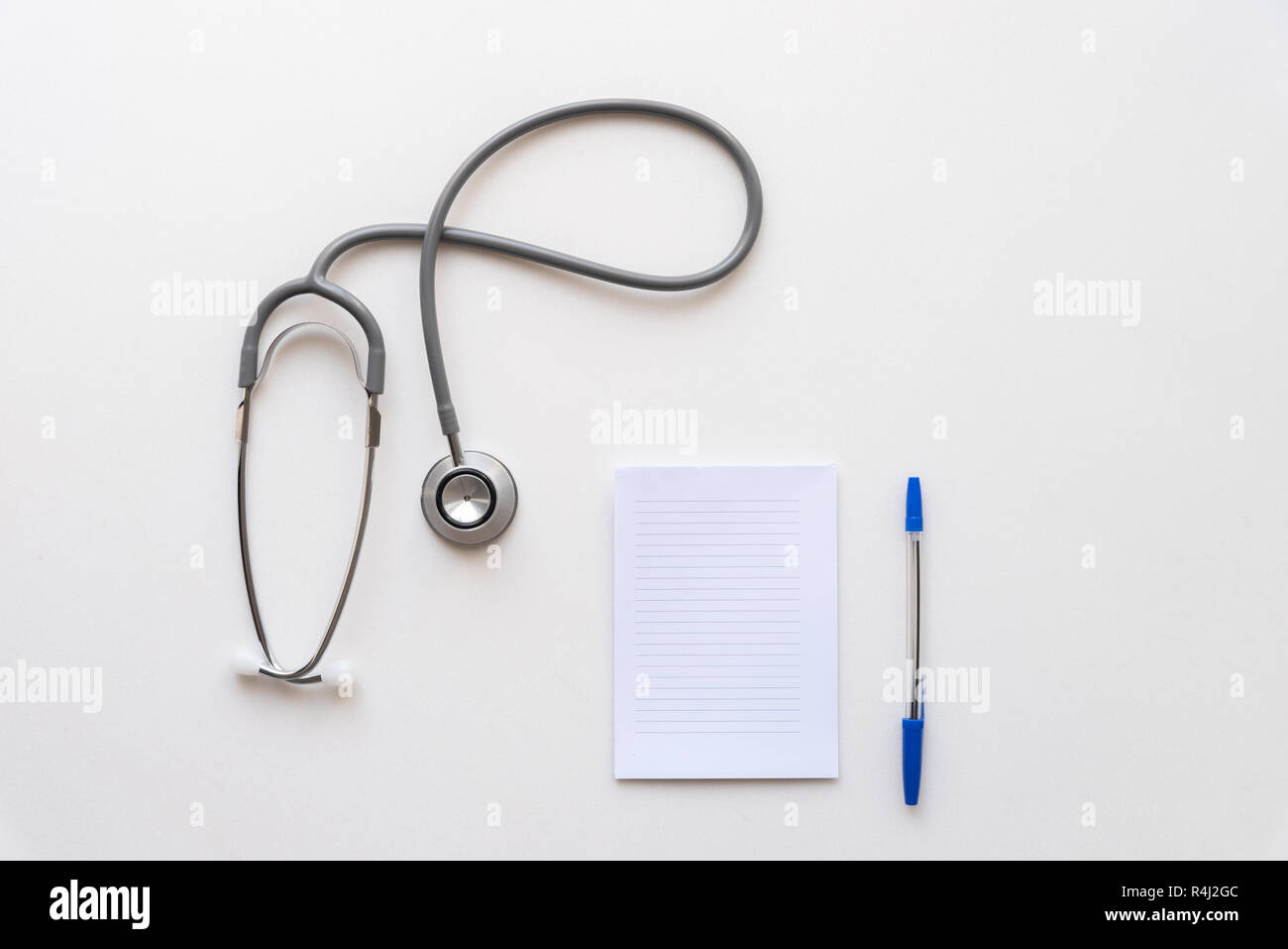 Stethoscope and notebook with pen. Medical concept Stock Photo - Alamy