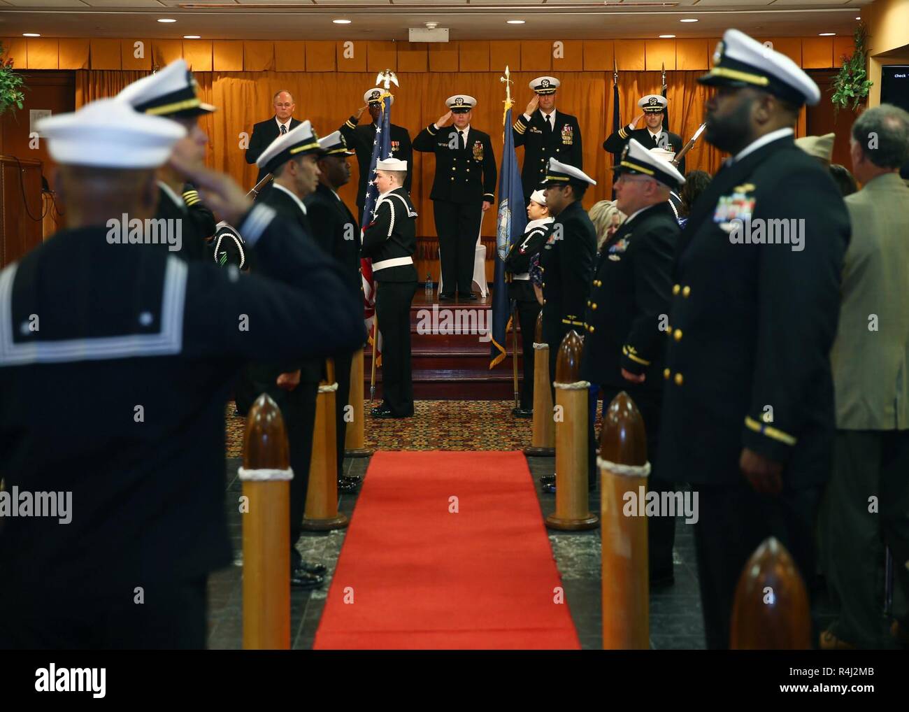 VIRGINIA BEACH, Va. (Oct. 26, 2018) Sailors salute the American flag ...