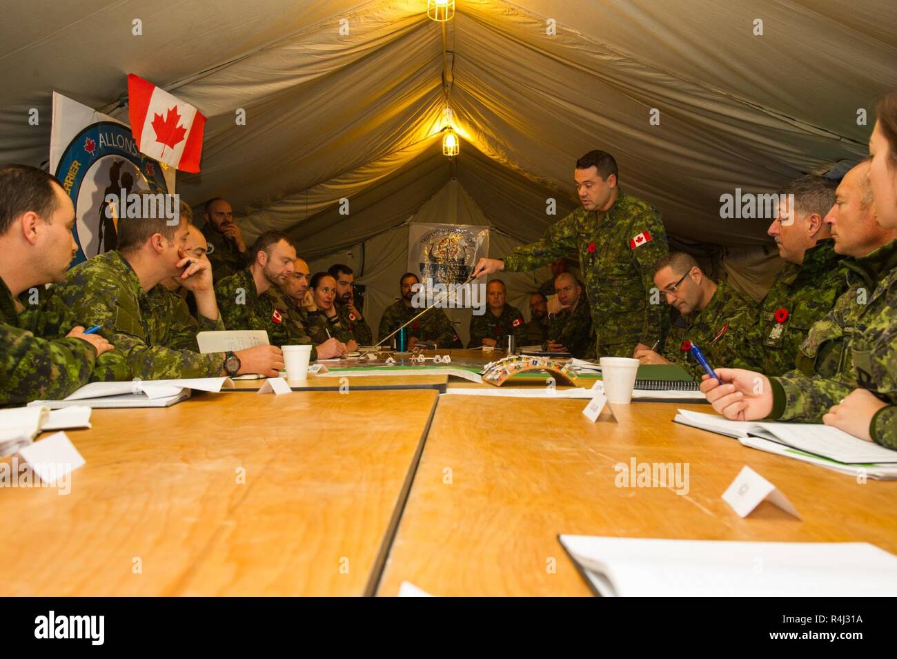 Members of 5 Canadian Mechanized Brigade headquarters and International ...