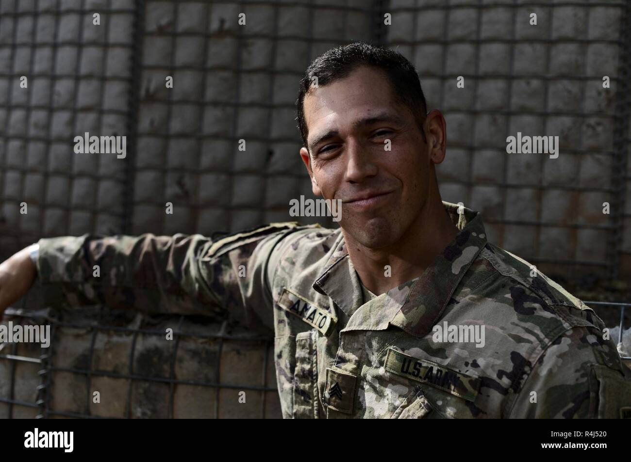 U.S. Army Sgt. Michael Amato, assigned to the 403rd Civil Affairs ...
