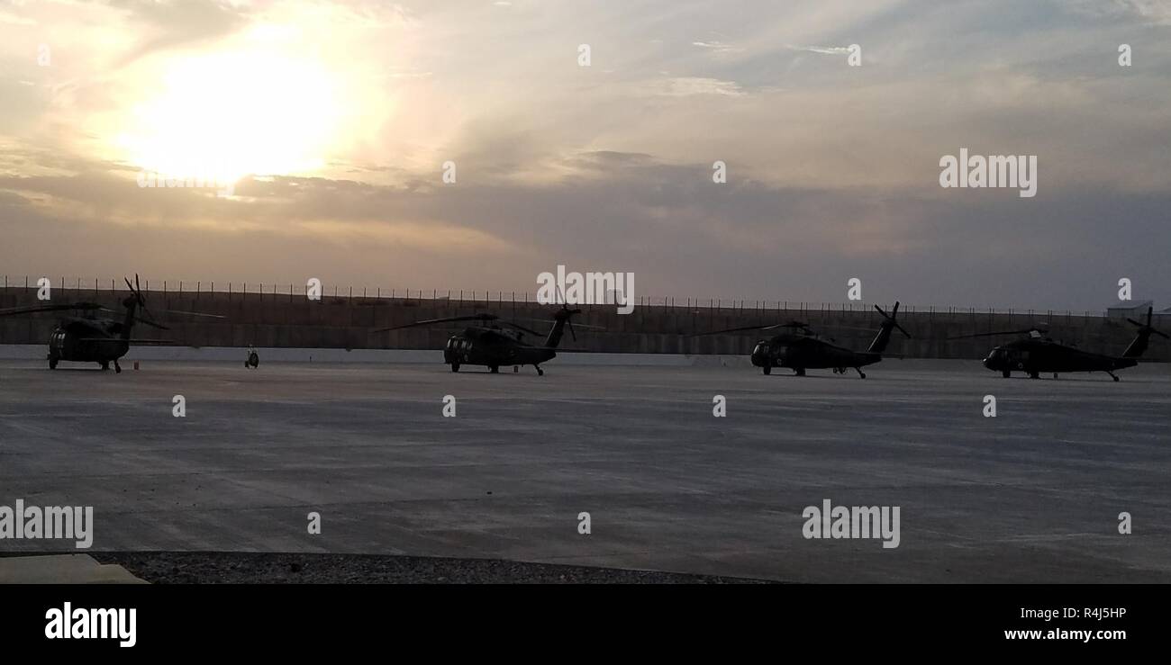 As the sun sets on the Kandahar Air Field, the UH-60’s on the Tango ...