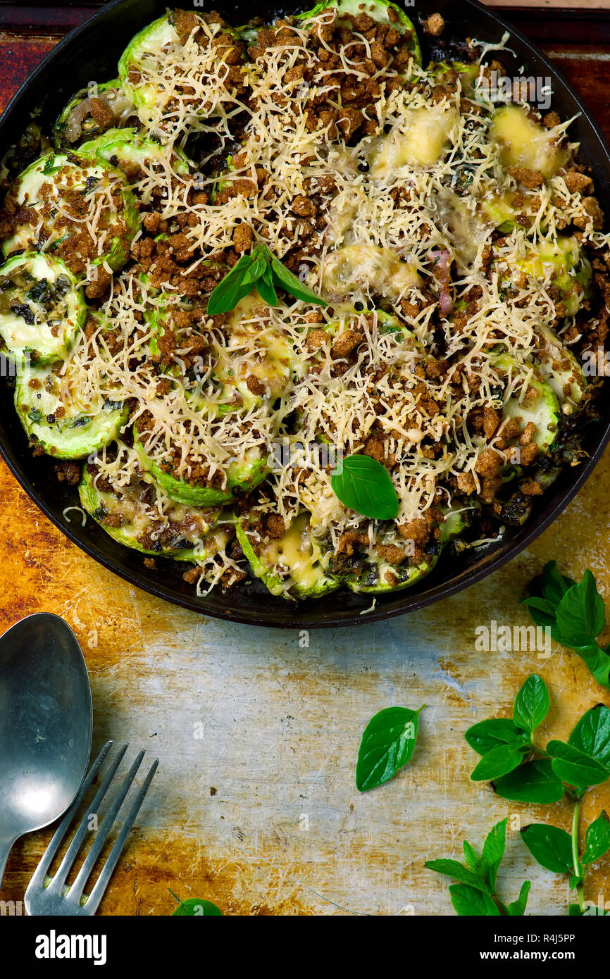 gratin from vegetable marrows with herbs. style vintage. top view ...