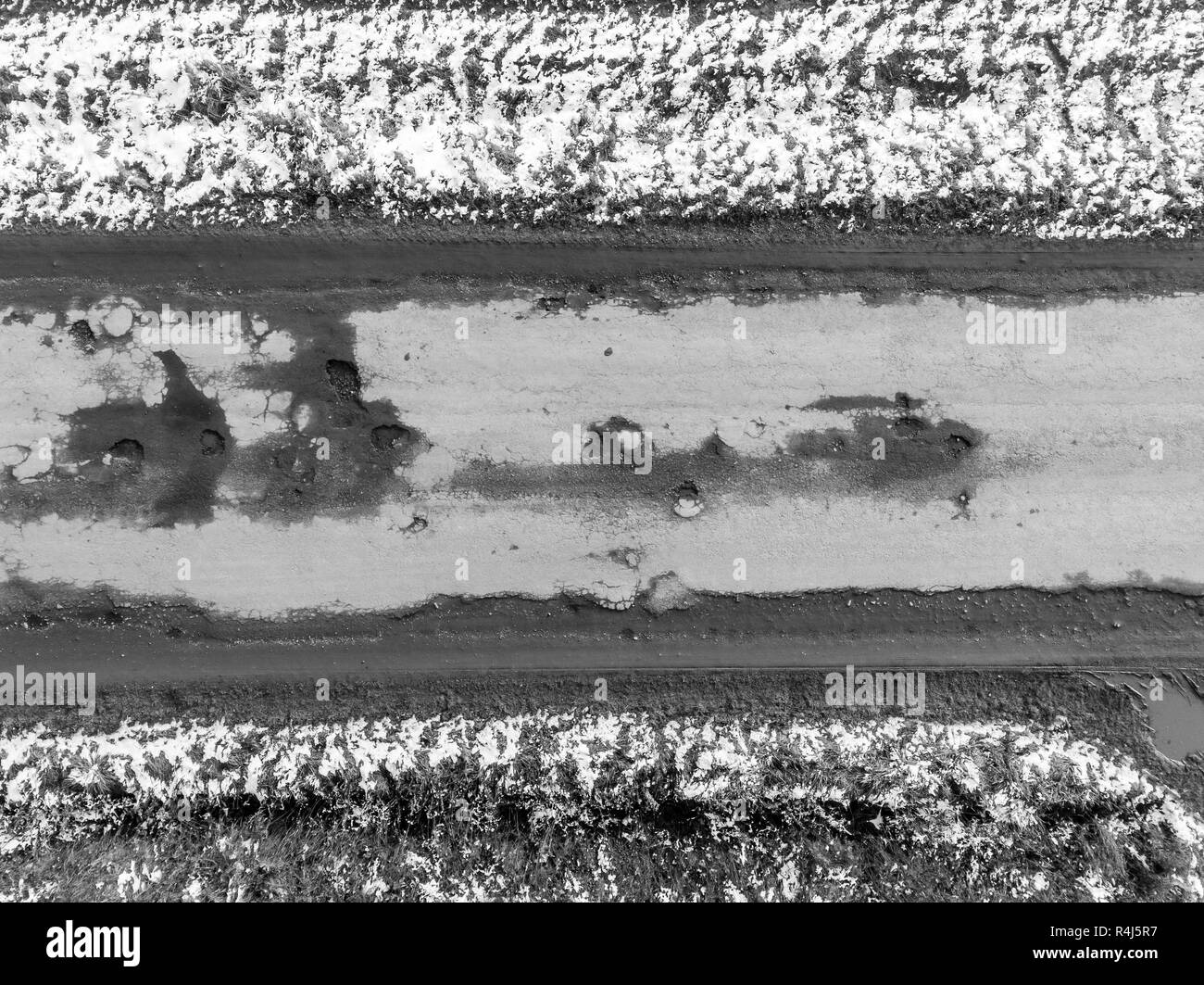 Destroyed road, difficult traffic area, threat of traffic accident ...