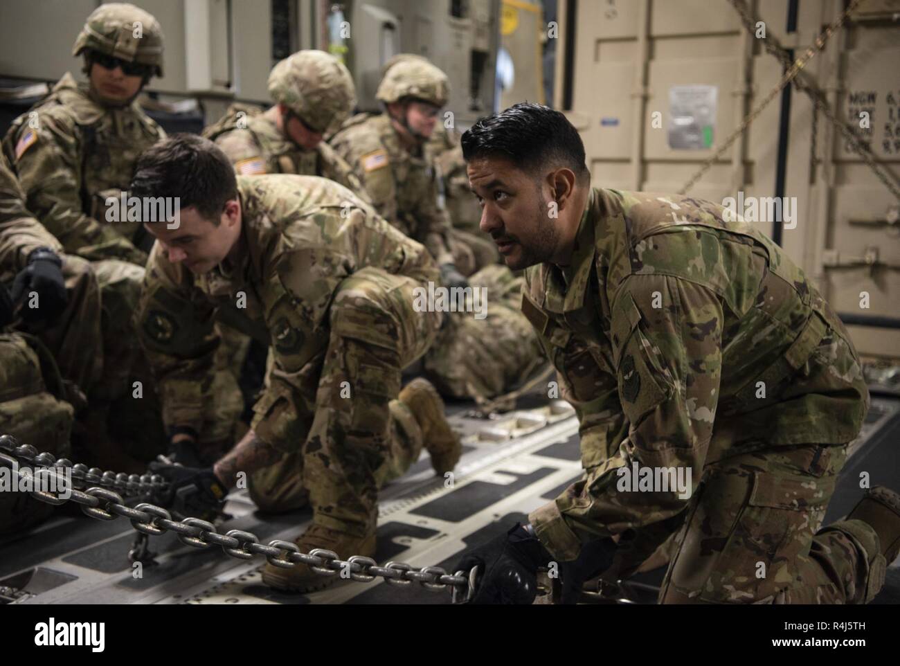 Airman 1st Class Trevor Pearce, a loadmaster with the 3rd Airlift ...