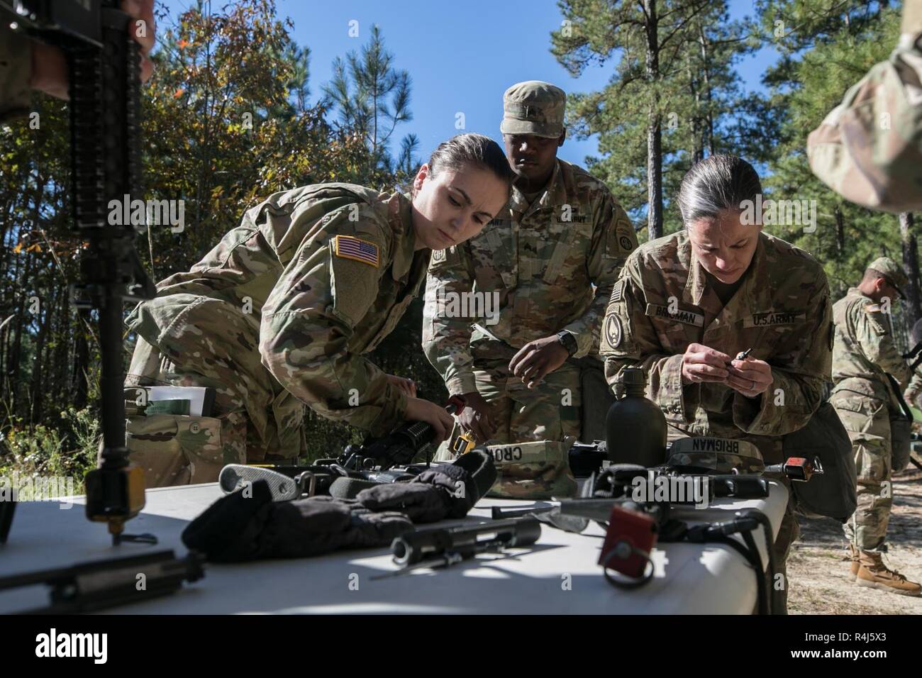 Candidates participating for the Expert Field Medical Badge disassemble ...