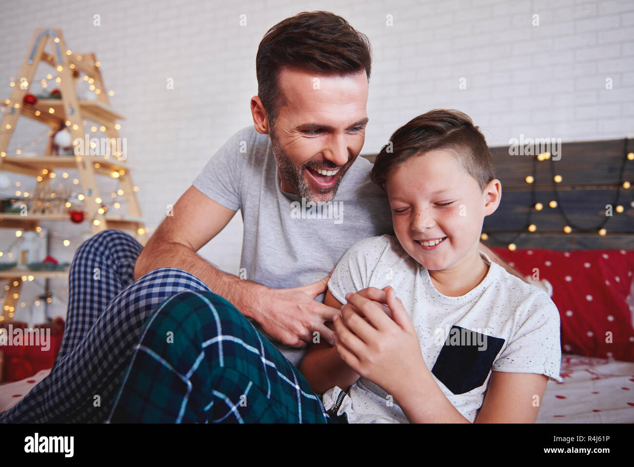 Happy boy with father in christmas time Stock Photo - Alamy
