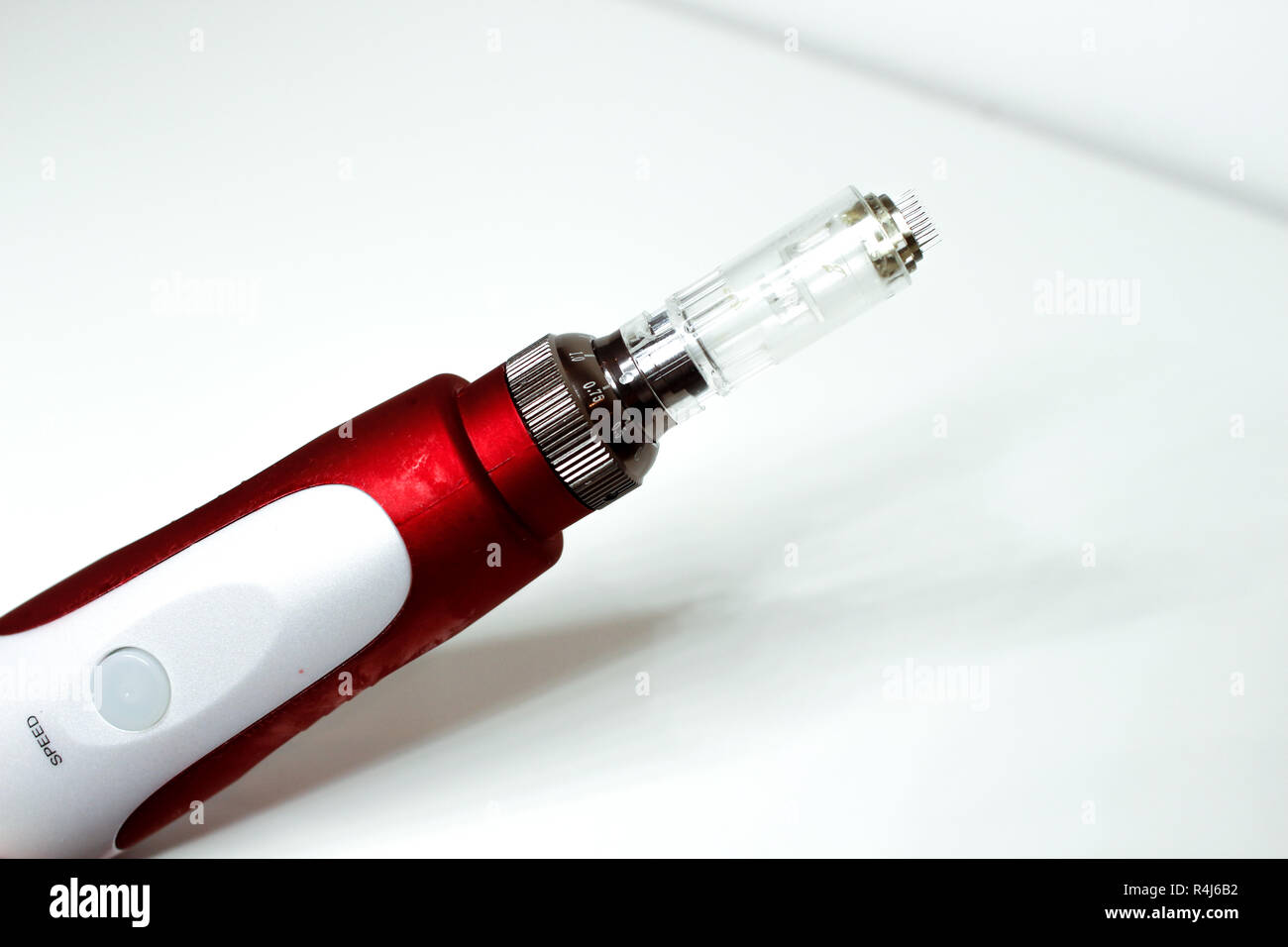 Dermis stamp electric pen. Dermapen. Needle mesotherapy treatment Stock ...