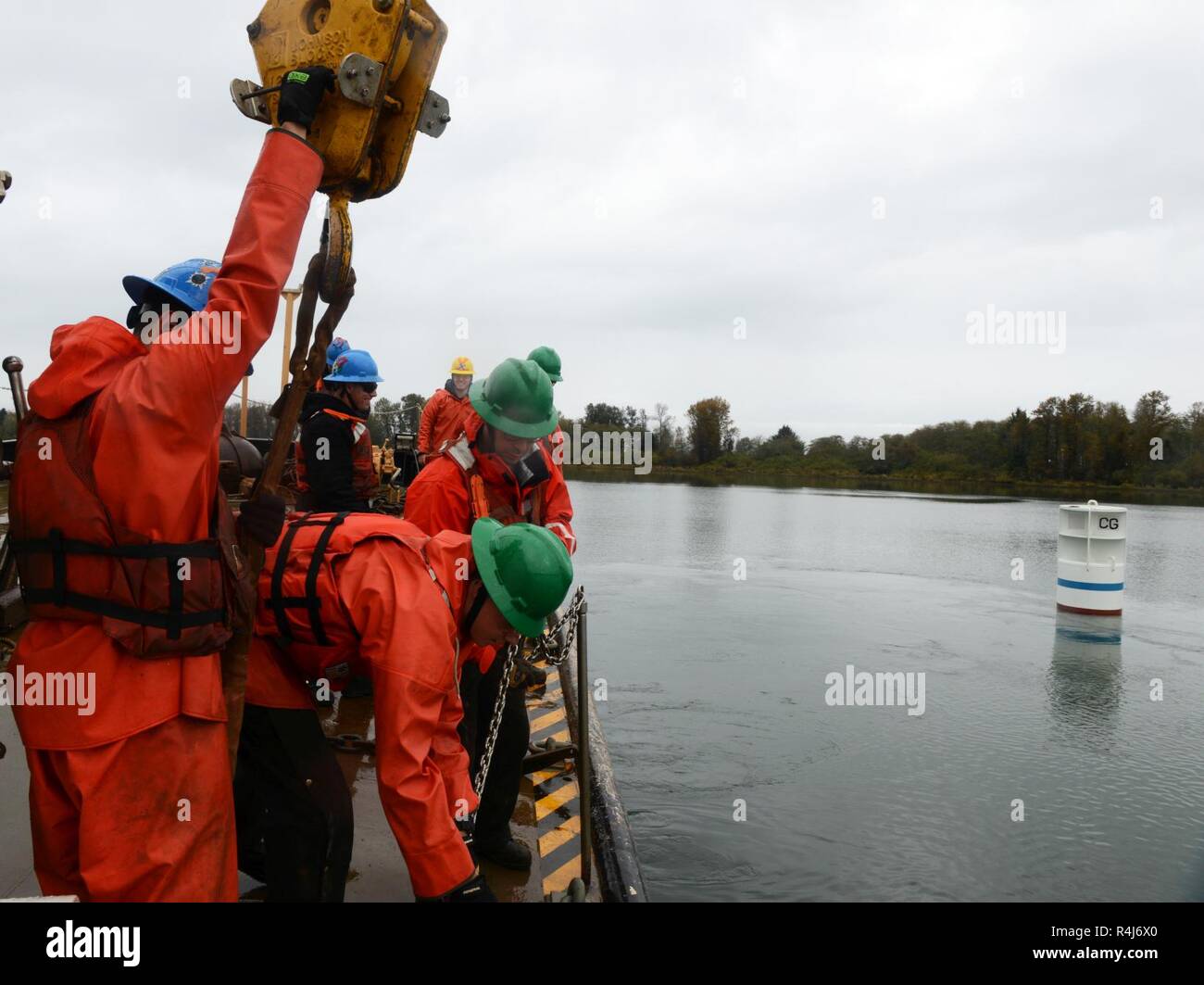 Crewmembers aboard the Coast Guard Cutter Bluebell reset the safety ...