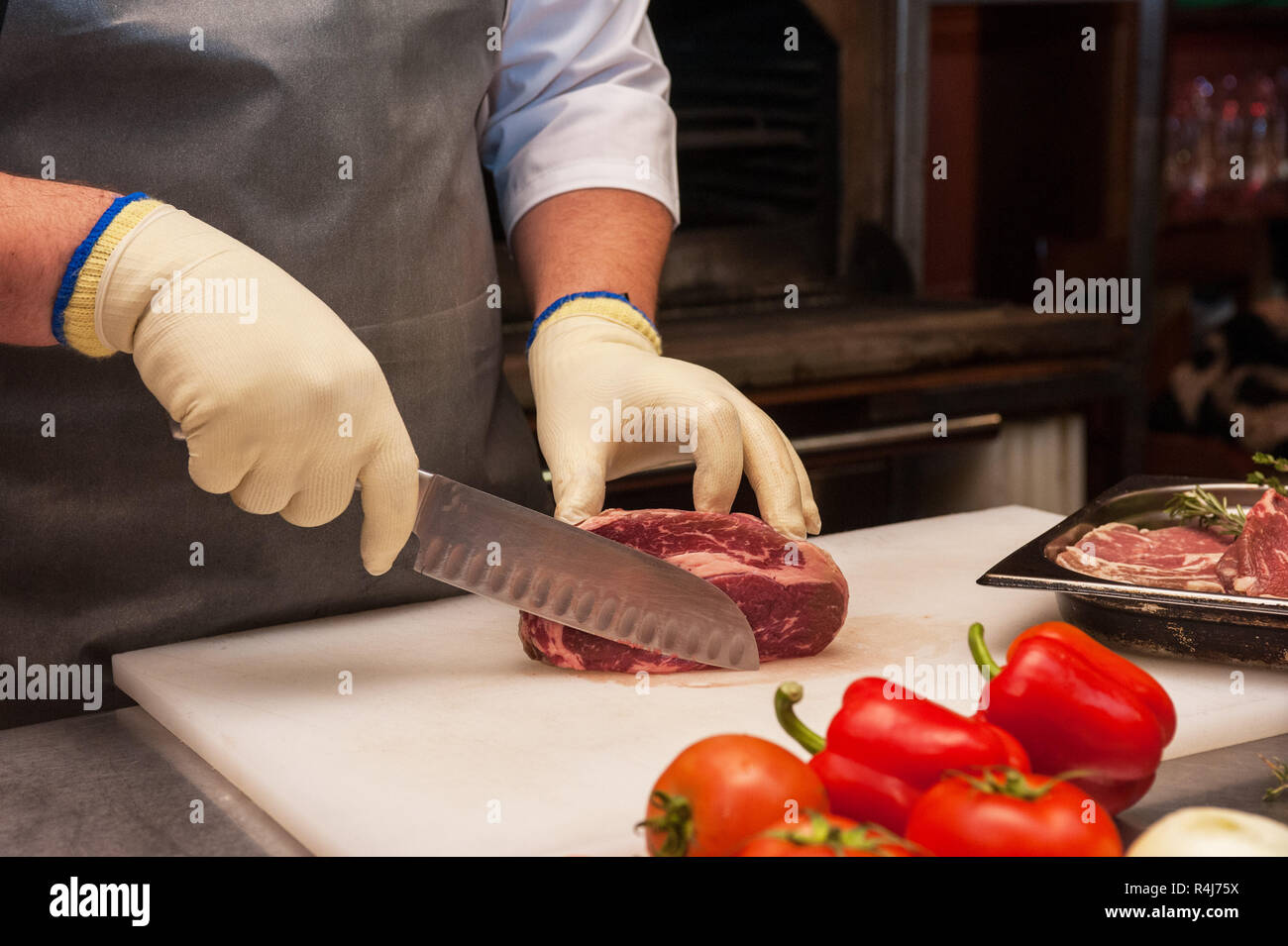 Chef cooks raw beef vegetables hi-res stock photography and images - Alamy