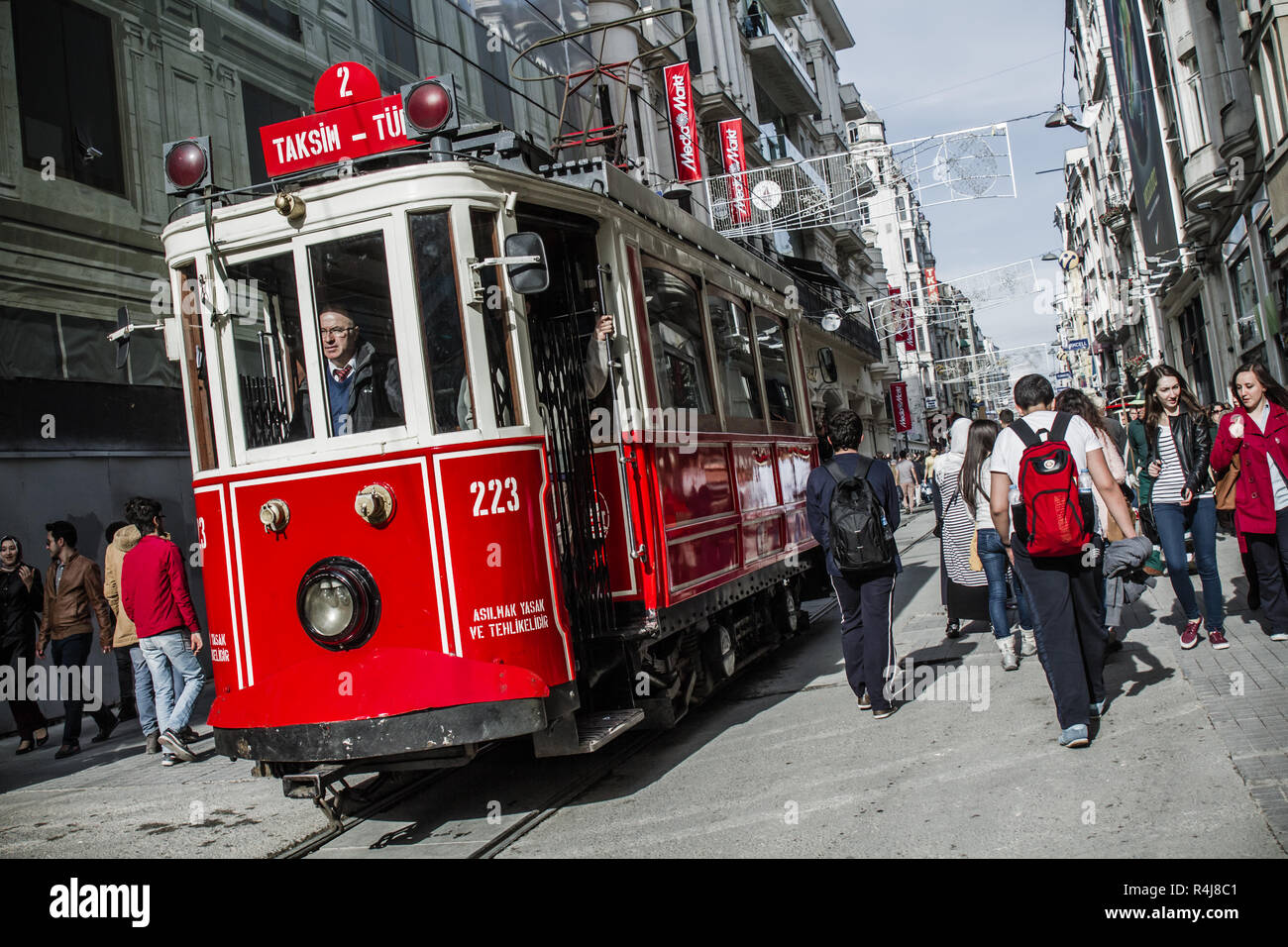 ISTANBUL, TURKEY - MAR 27, 2014: Nostalgic red tram in istiklal street ...