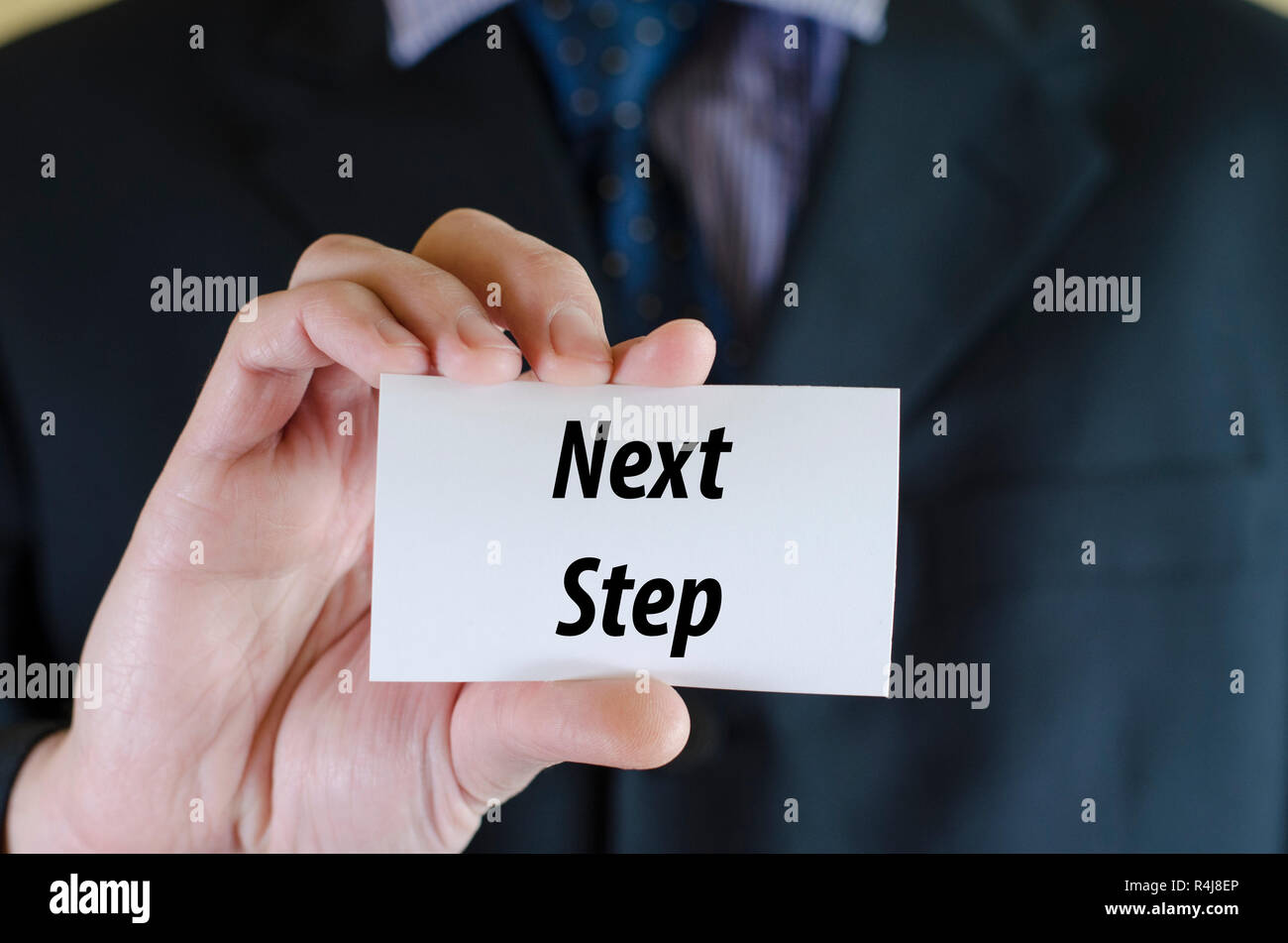 Next step text concept Stock Photo - Alamy