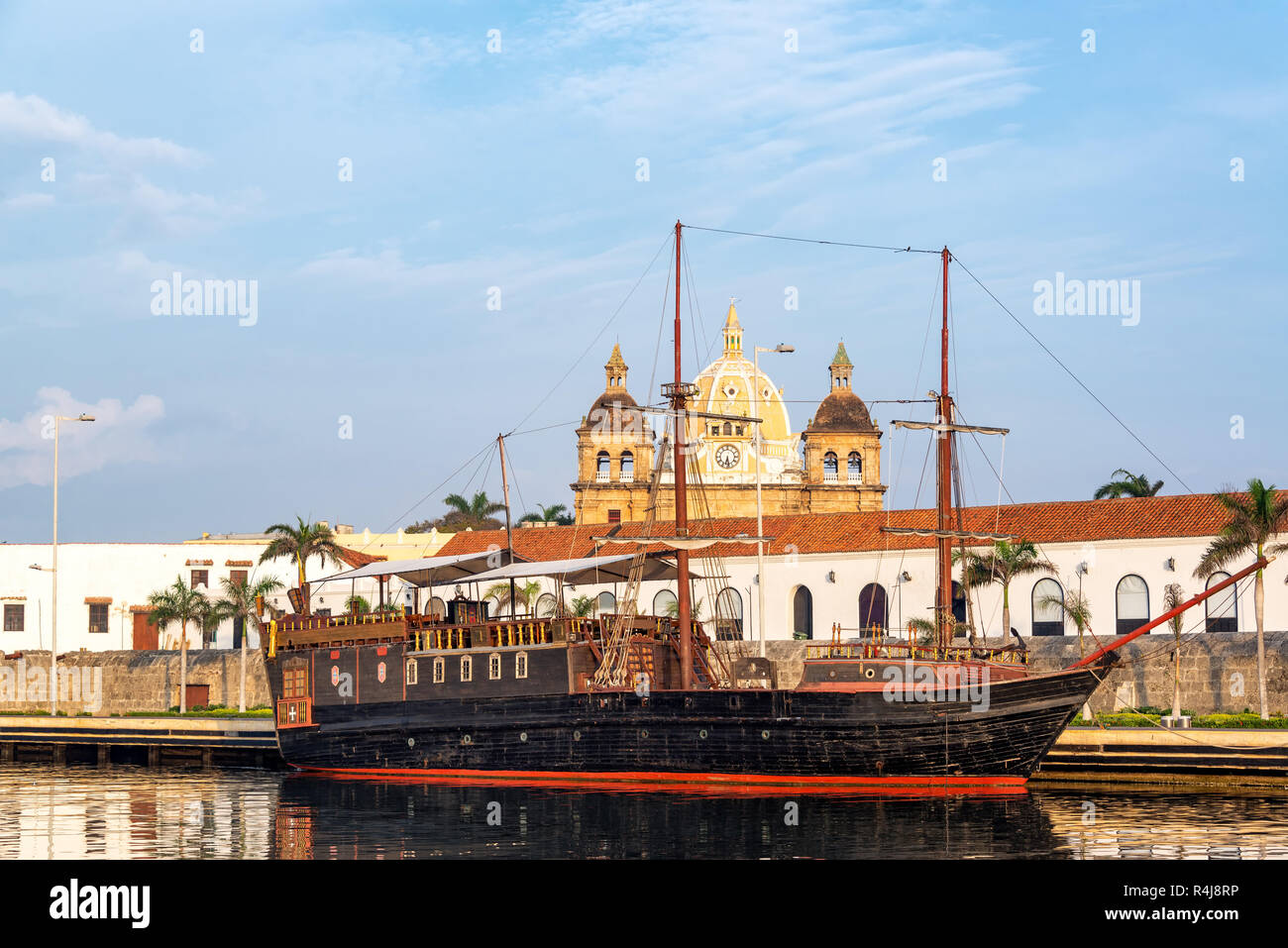 Pirate Ship and Church View Stock Photo - Alamy