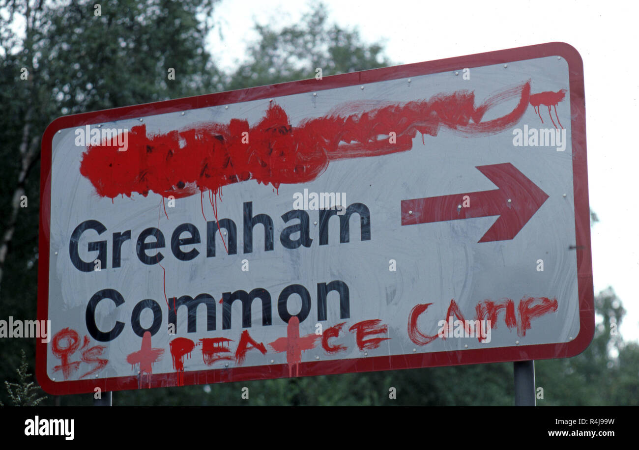 Greenham Common defaced road sign Stock Photo - Alamy