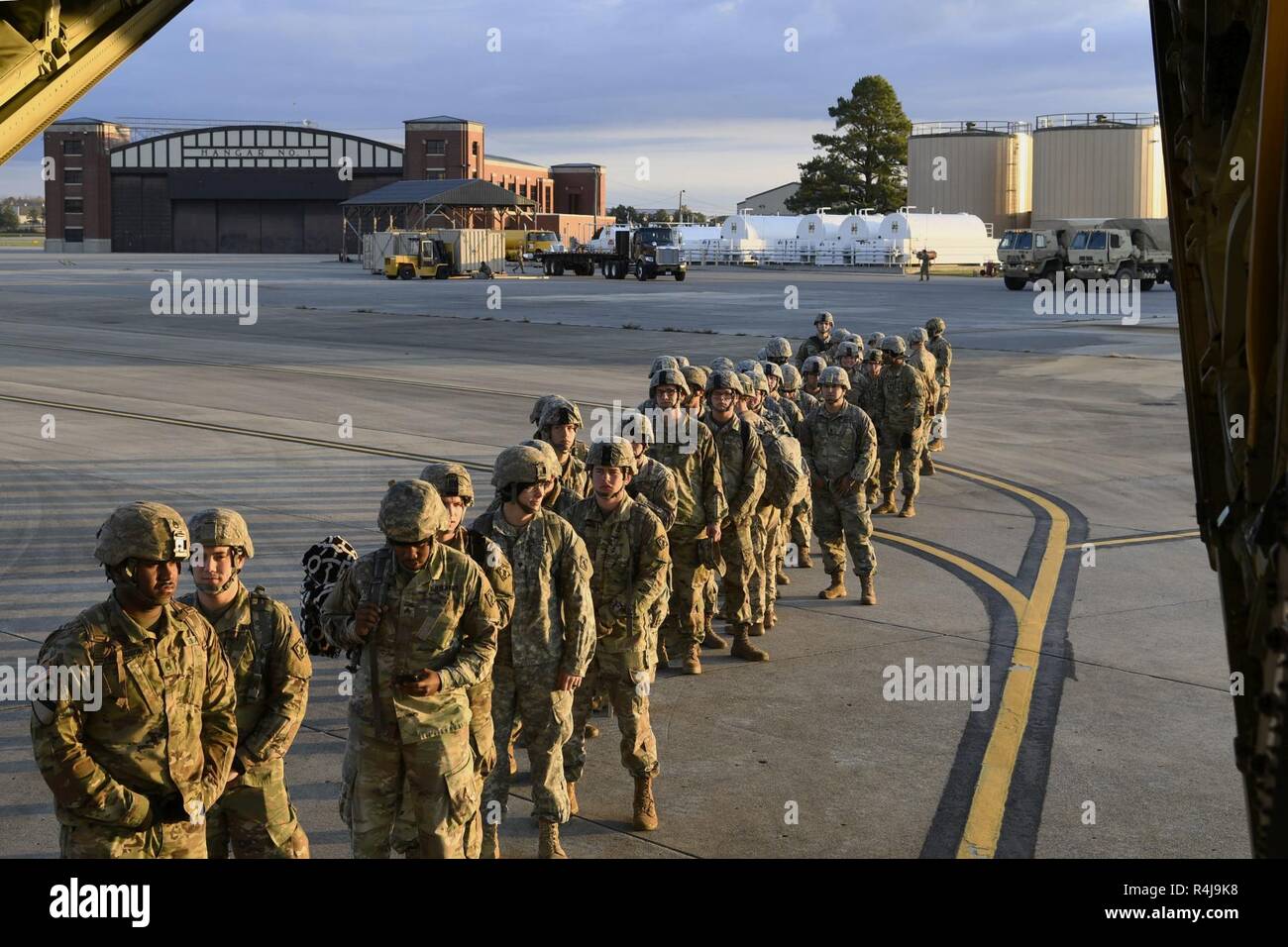 Soldiers from the 541st Sapper Company prepare to board an Air Force C ...