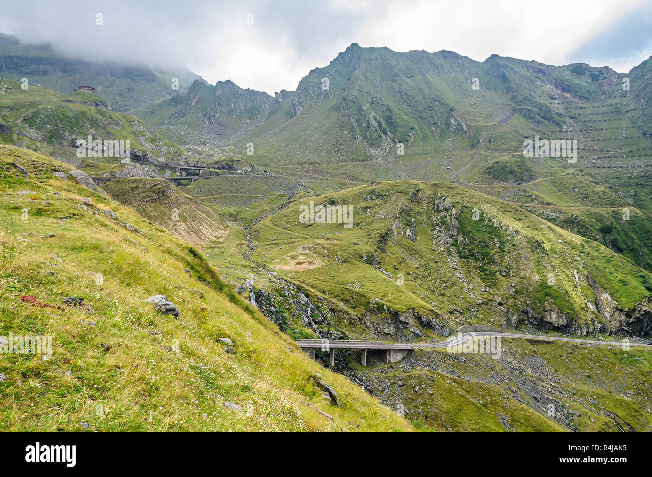 The Transfagarasan road in Fagaras mountains, Carpathians with green ...