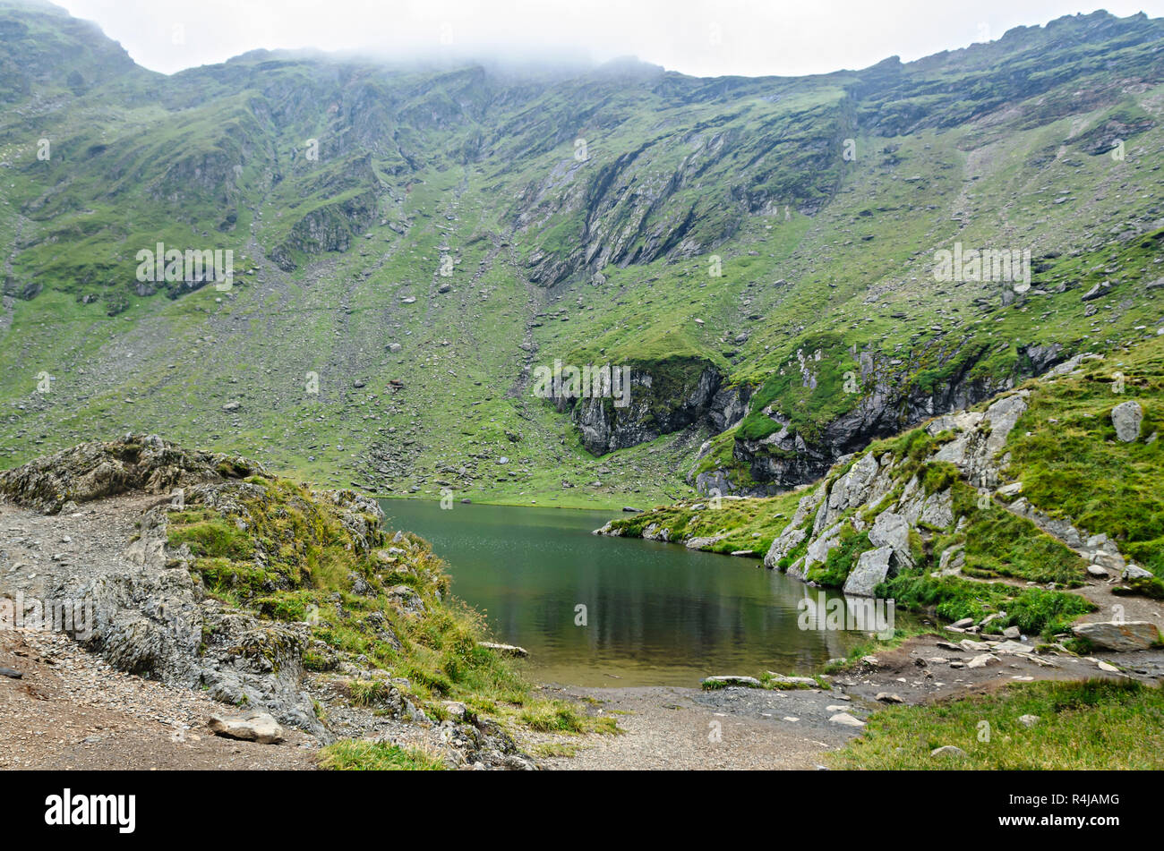 The glacier lake called Balea (Balea Lac) on the Transfagarasan road ...