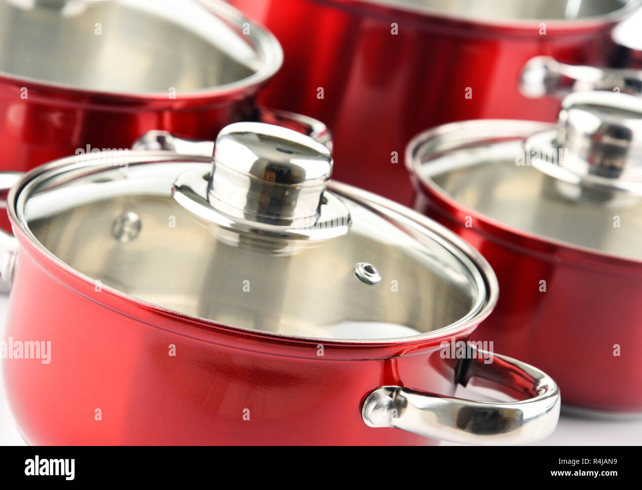 Composition with a set of steel pots Stock Photo - Alamy