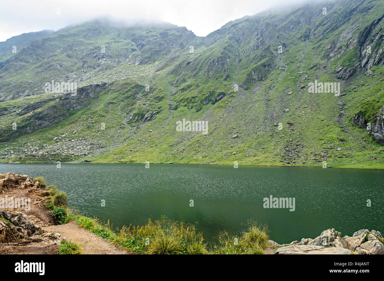 The glacier lake called Balea (Balea Lac) on the Transfagarasan road ...