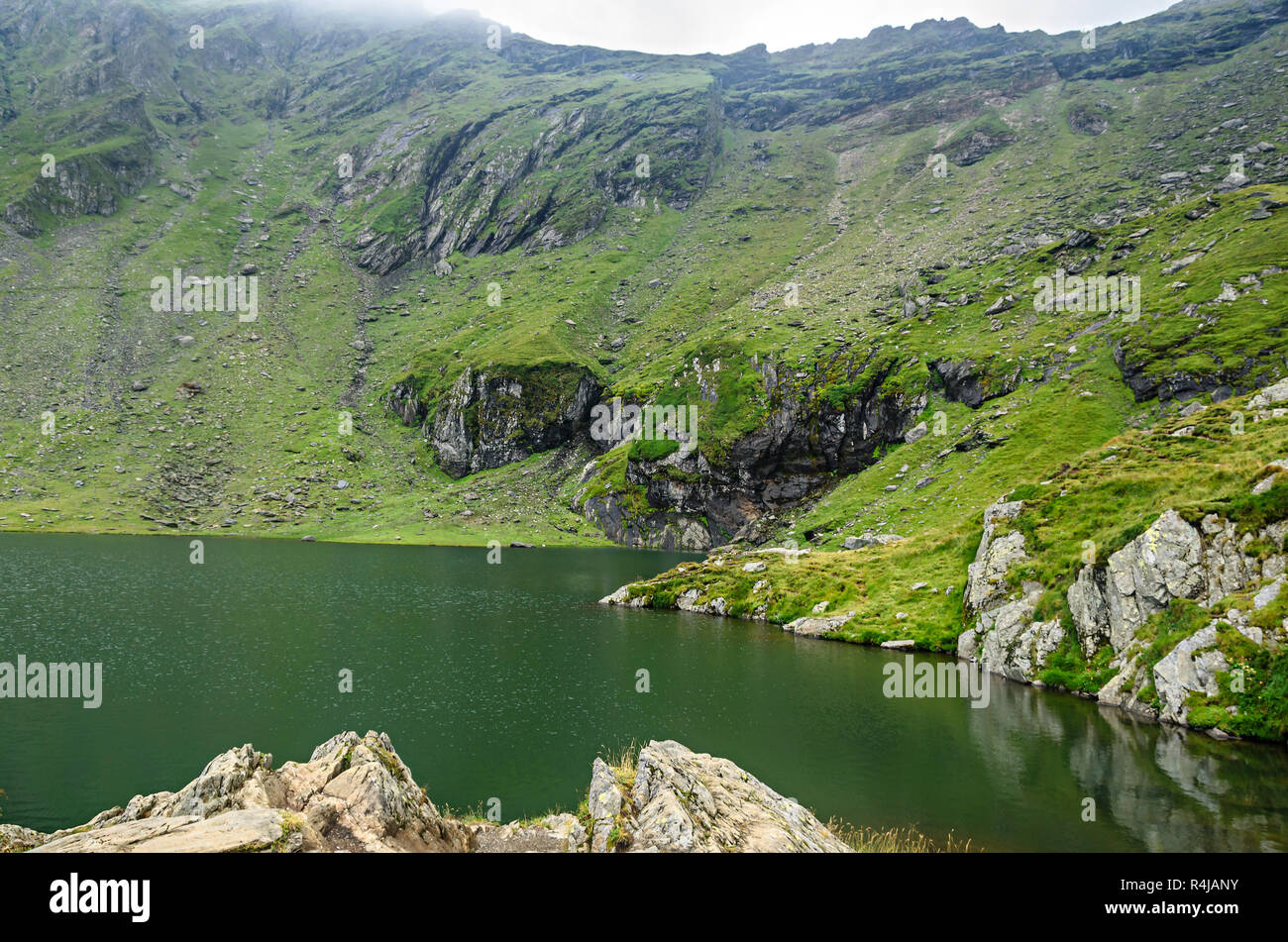 The glacier lake called Balea (Balea Lac) on the Transfagarasan road ...