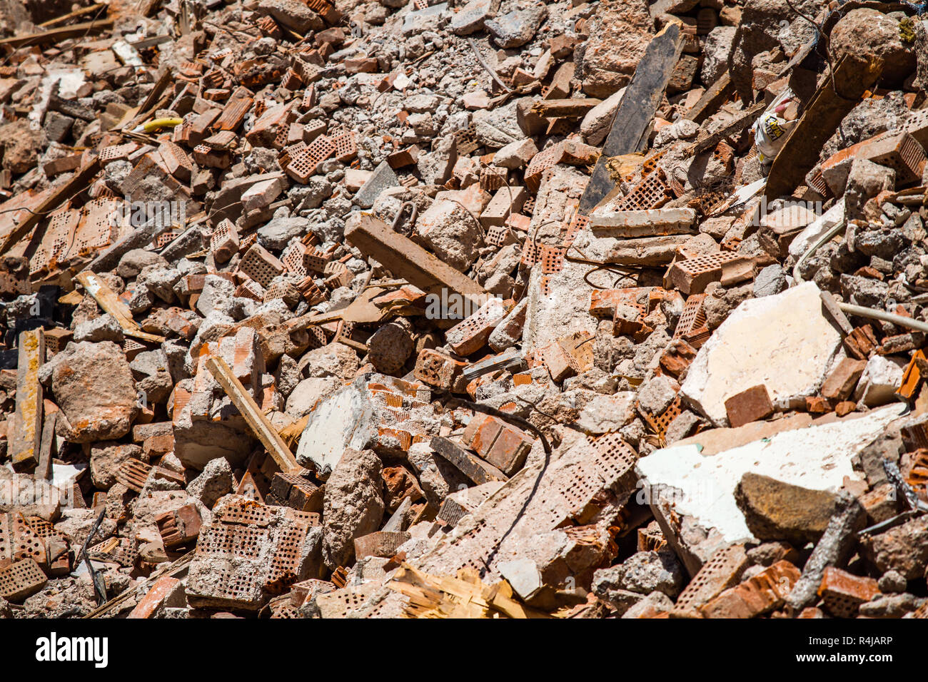 Rubble from the demolition of an old building under urban renewal ...