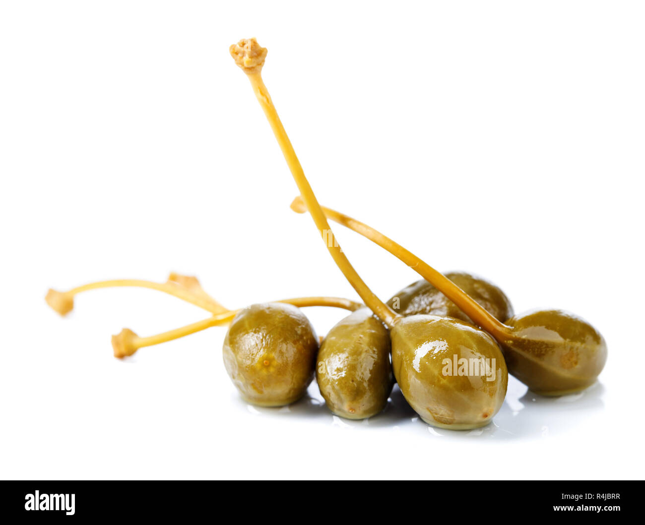 Pickled caper berries isolated on white background . Edible fruits of ...