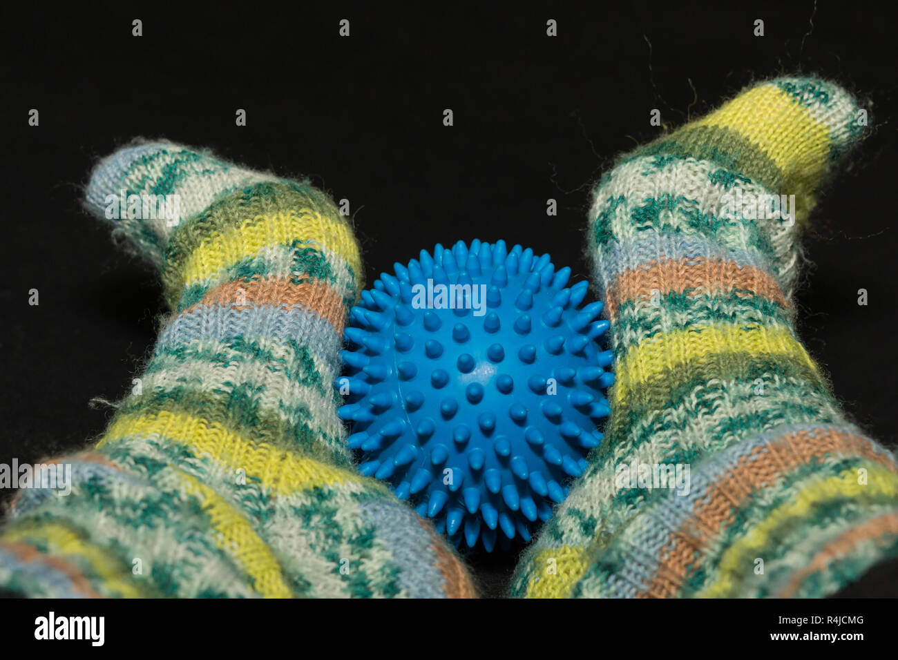 feet with knitted socks Stock Photo - Alamy