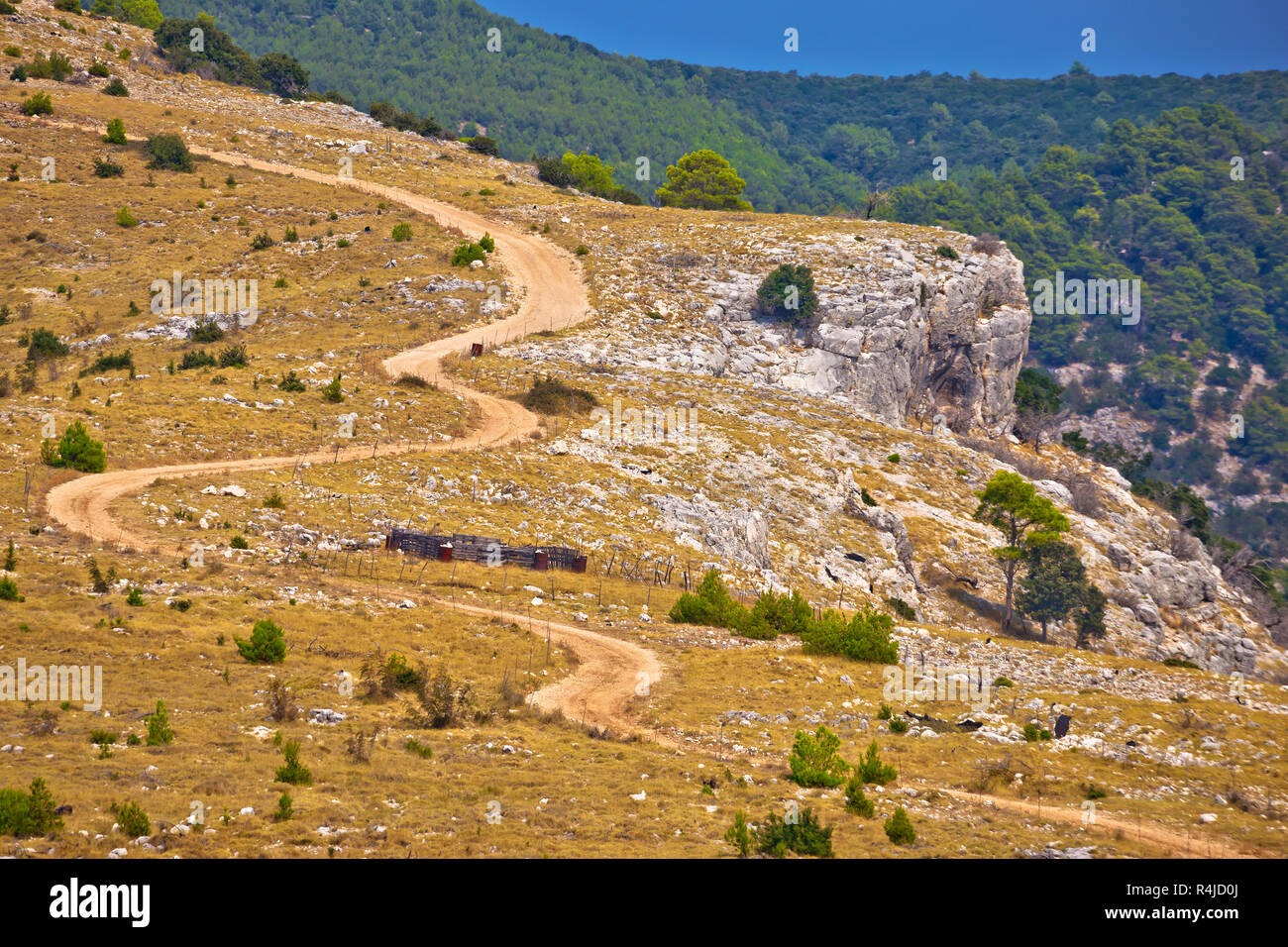Island of Brac desert scenic road Stock Photo - Alamy