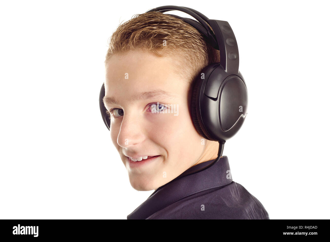 teenage boy with headphones isolated on a white background Stock Photo ...