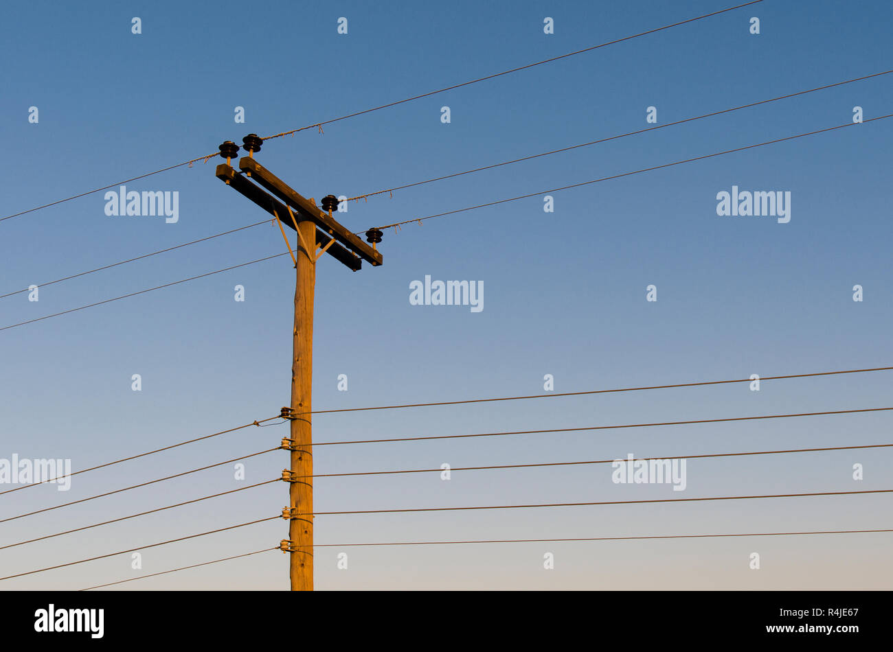 Power line on wooden poles Stock Photo - Alamy