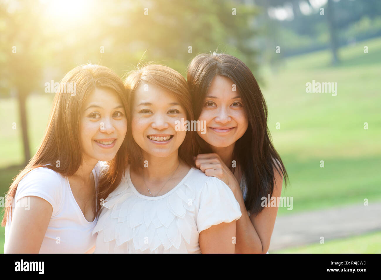 Asian female sisters Stock Photo - Alamy