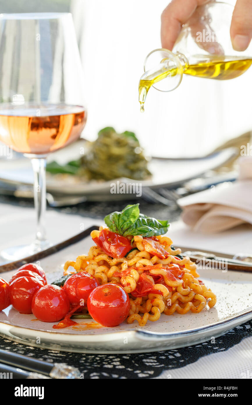 Oil pouring pasta hi-res stock photography and images - Alamy