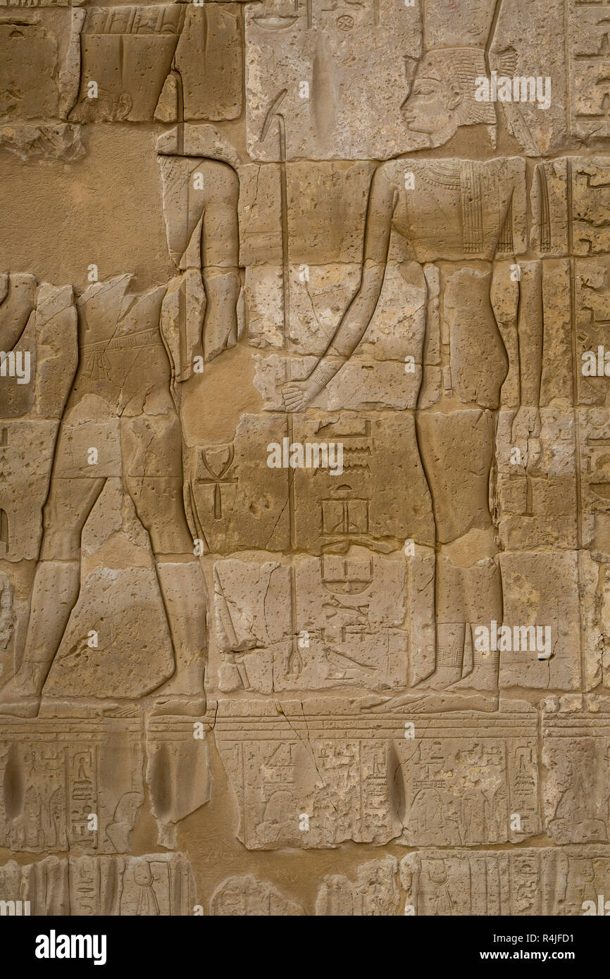 Symbols signs figures of the Pharaohs in Egypt, the wall in Luxor Stock ...