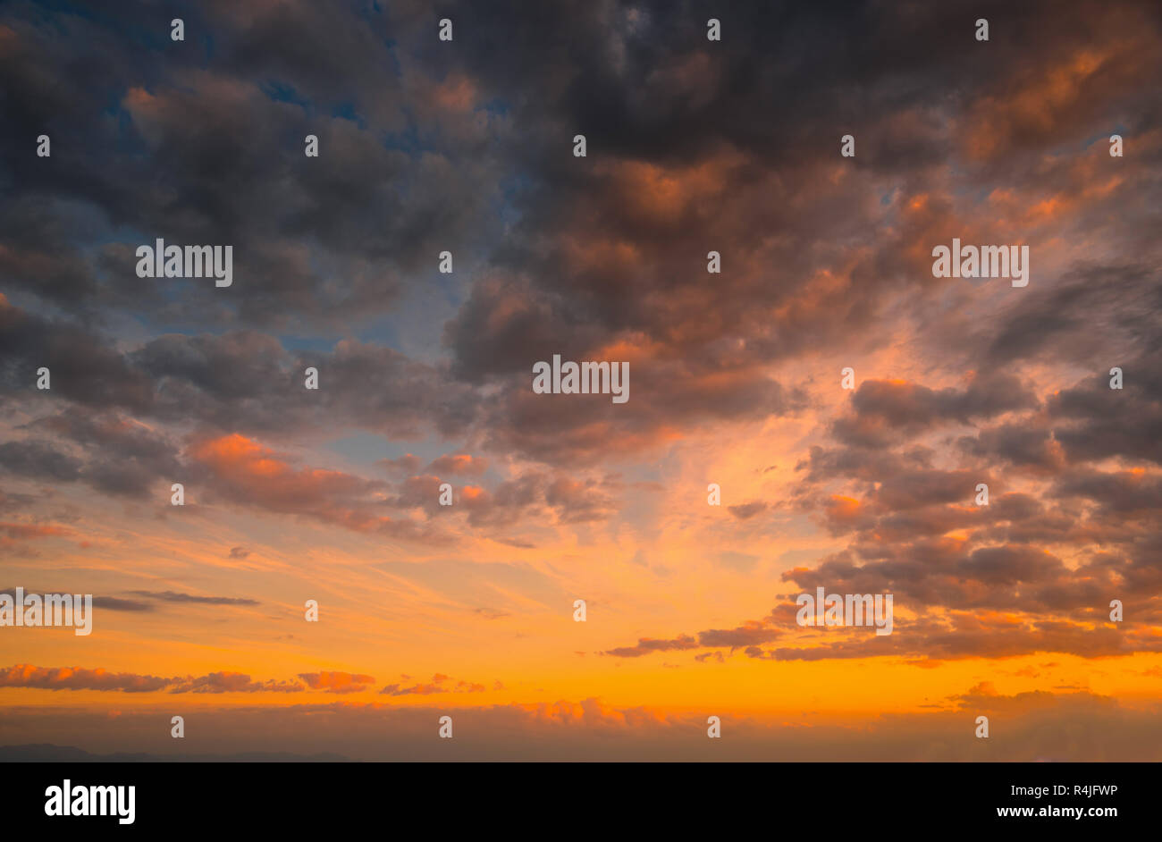 Sunset with dramatic sky background Stock Photo - Alamy
