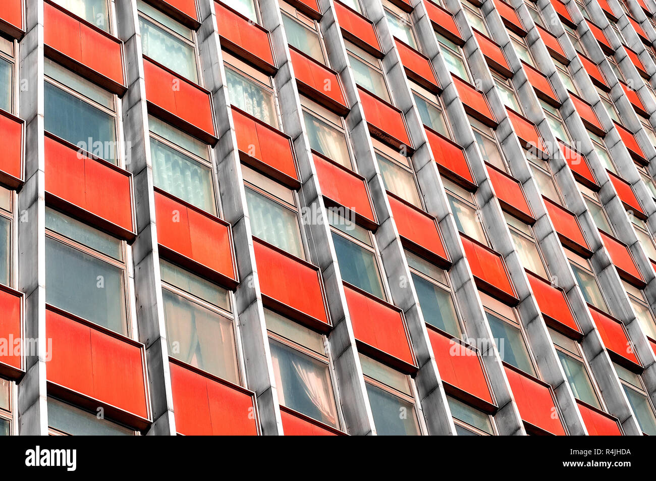 Multi-story office building with terracotta panels Stock Photo - Alamy