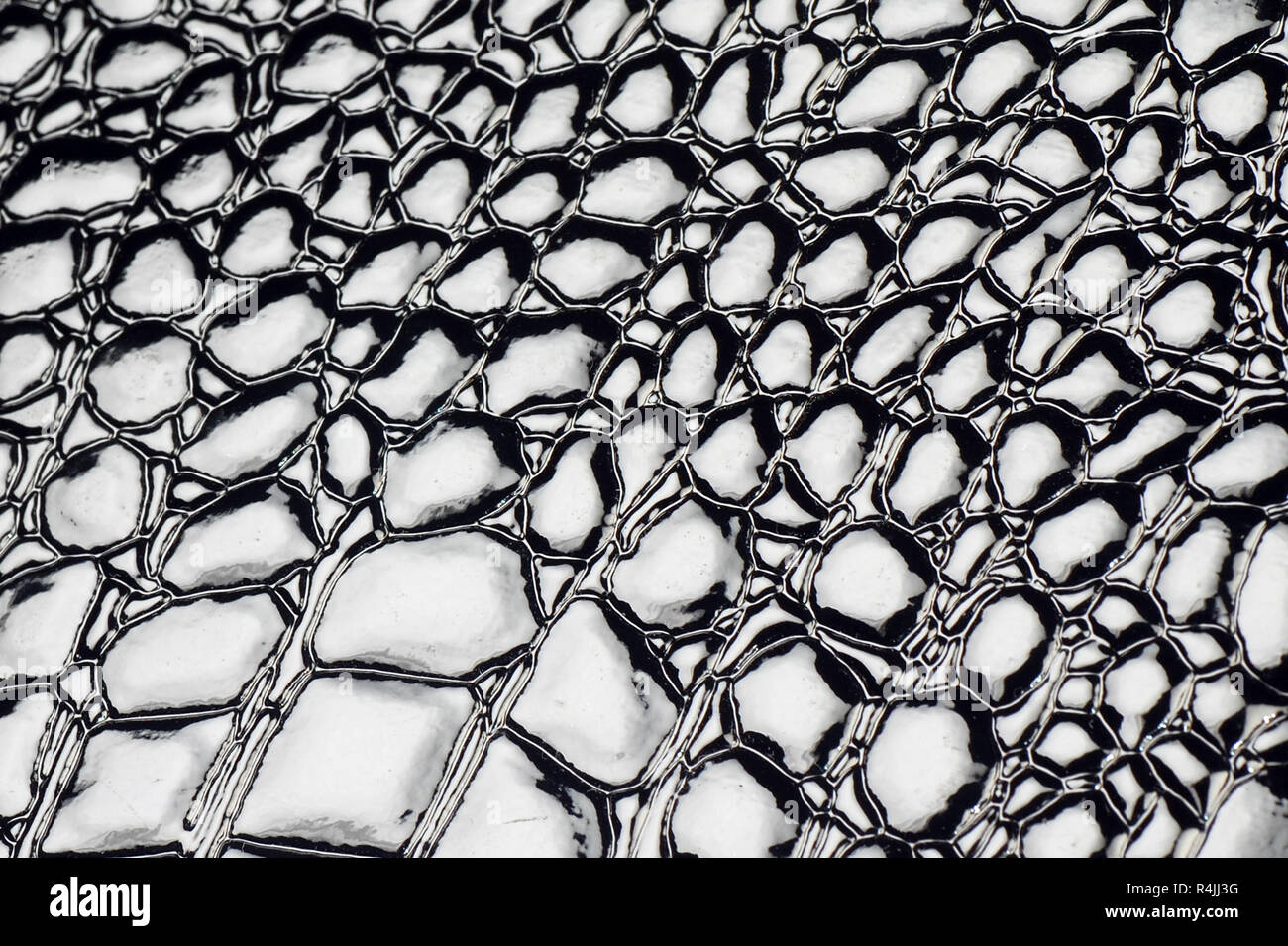 Black lacquered leather hi-res stock photography and images - Alamy
