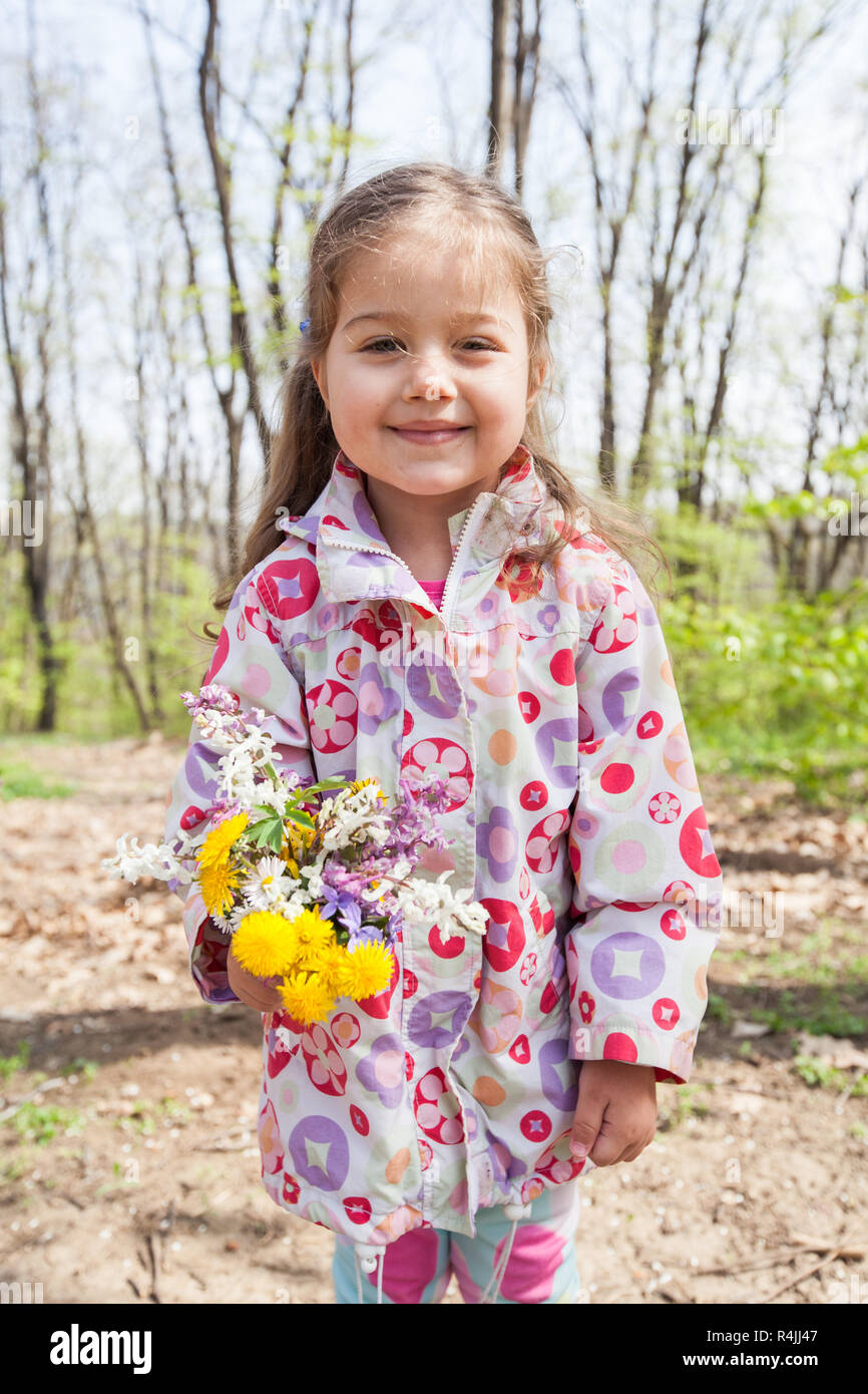 Spring Portrait of happy little girl Stock Photo - Alamy