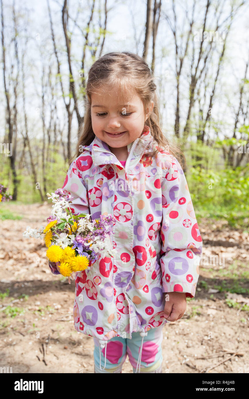 Spring Portrait of happy little girl Stock Photo - Alamy