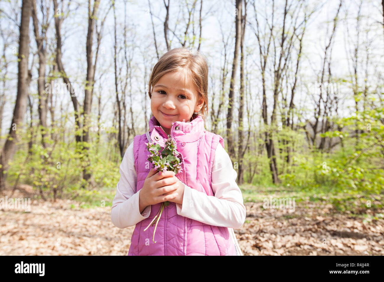 Spring Portrait of happy little girl Stock Photo - Alamy